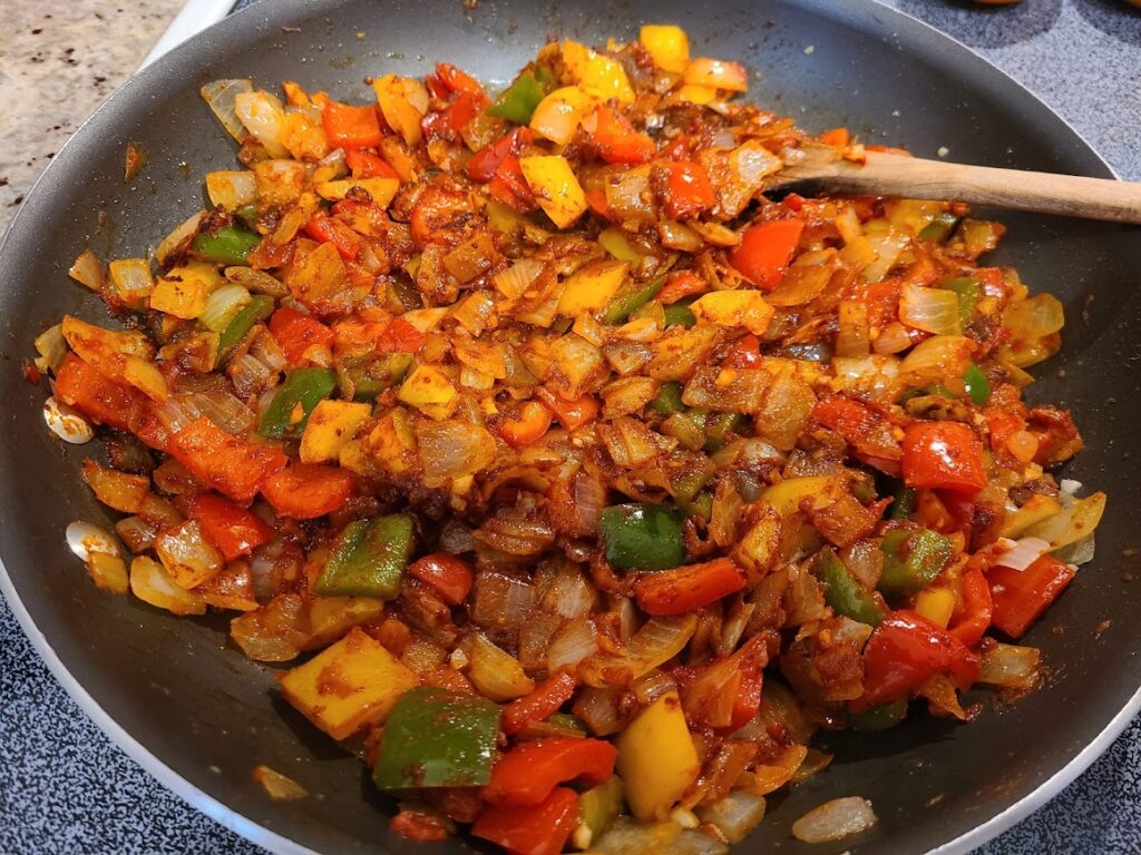 Chakshuka (Eggs simmered in peppers & tomatoes) – Israel – Cooking With ...